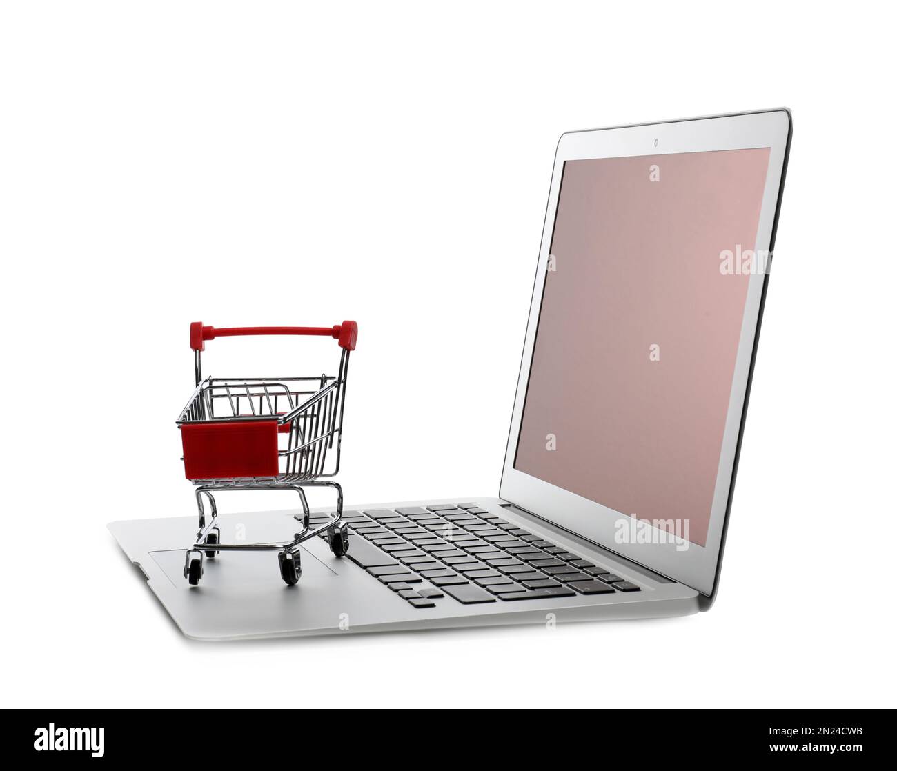 Internet shopping. Laptop with small cart isolated on white Stock Photo ...