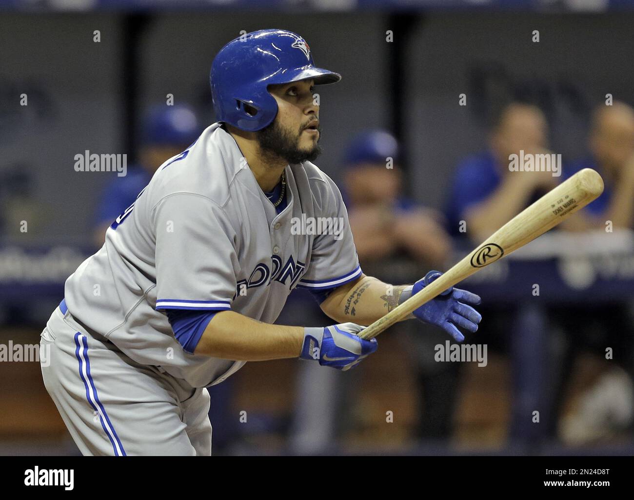 Toronto Blue Jays' Dioner Navarro watches his home run off Tampa Bay ...