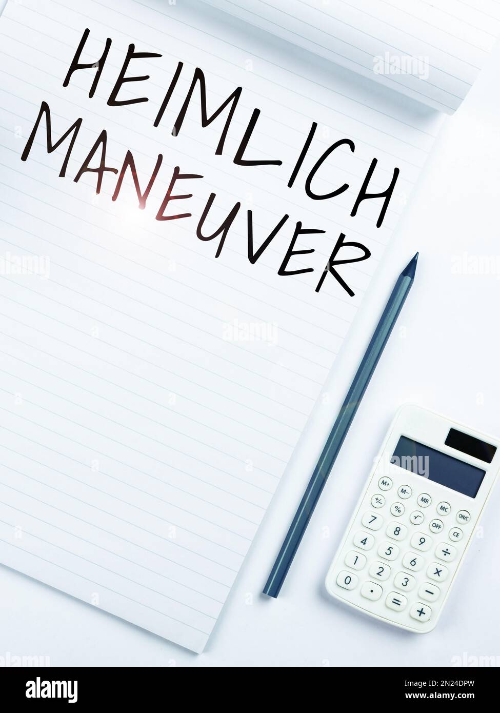 Hand writing sign Heimlich Maneuver. Word for application of upward ...