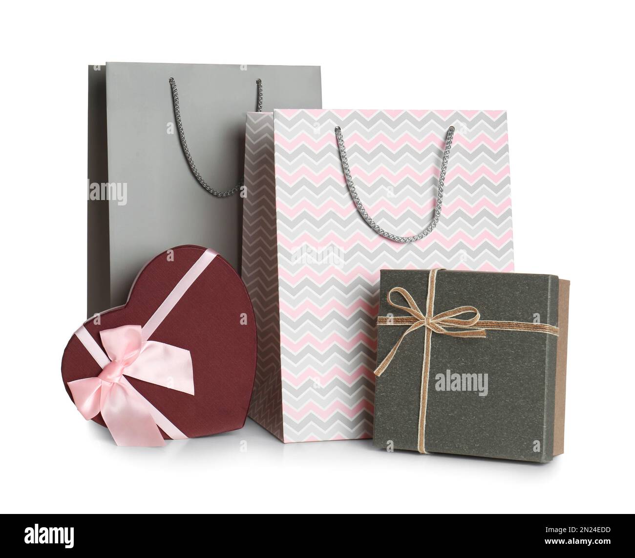 Paper bags and gift boxes isolated on white Stock Photo - Alamy