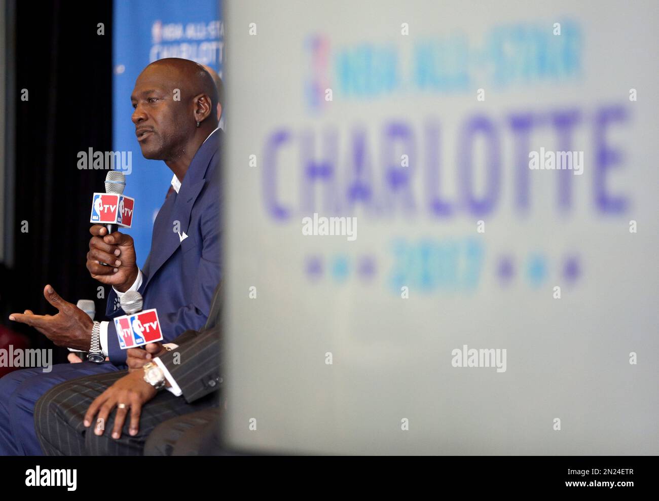 Charlotte Hornets owner Michael Jordan answers a question during a news ...