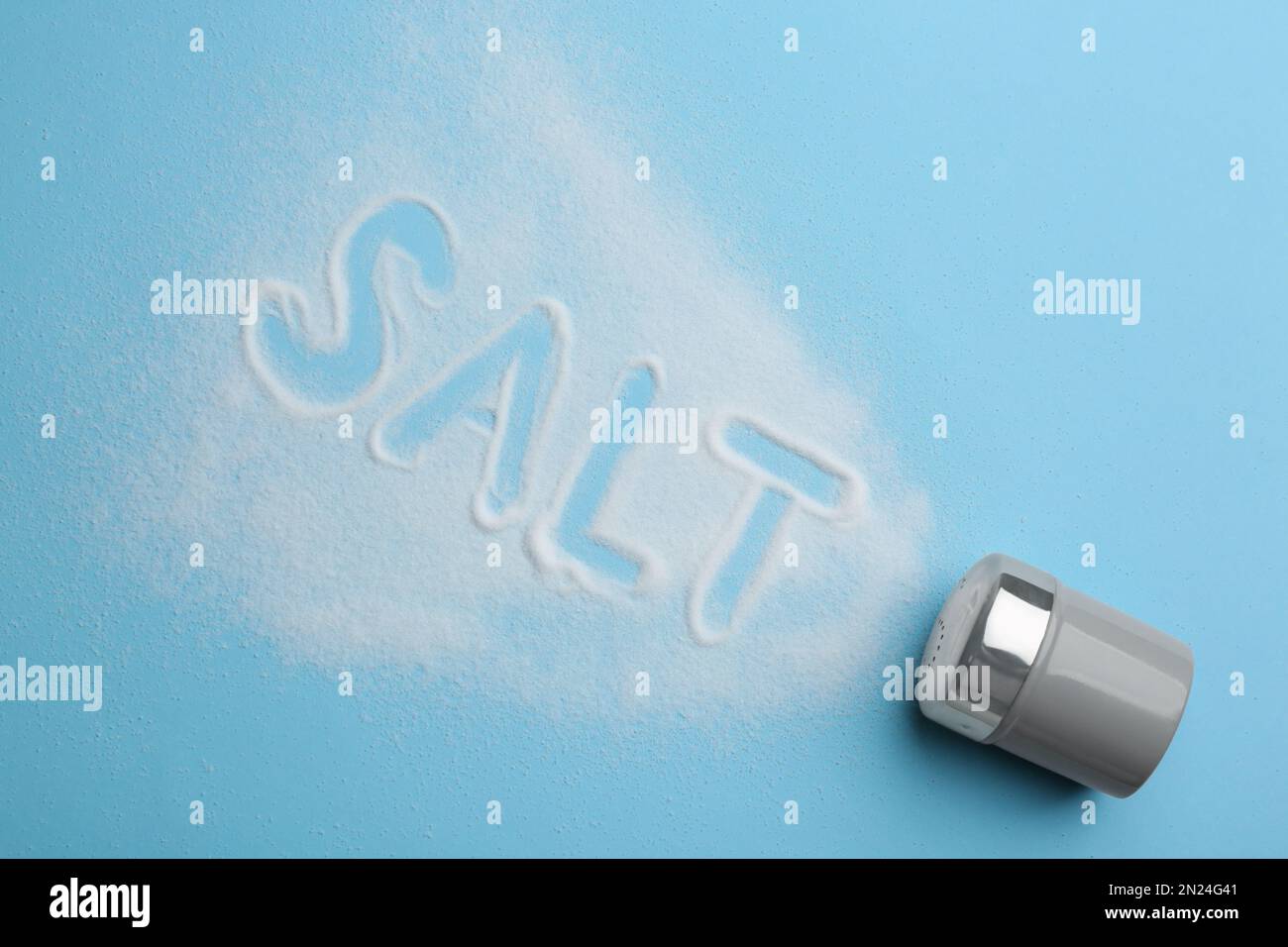 Salt shaker on light hi-res stock photography and images - Alamy