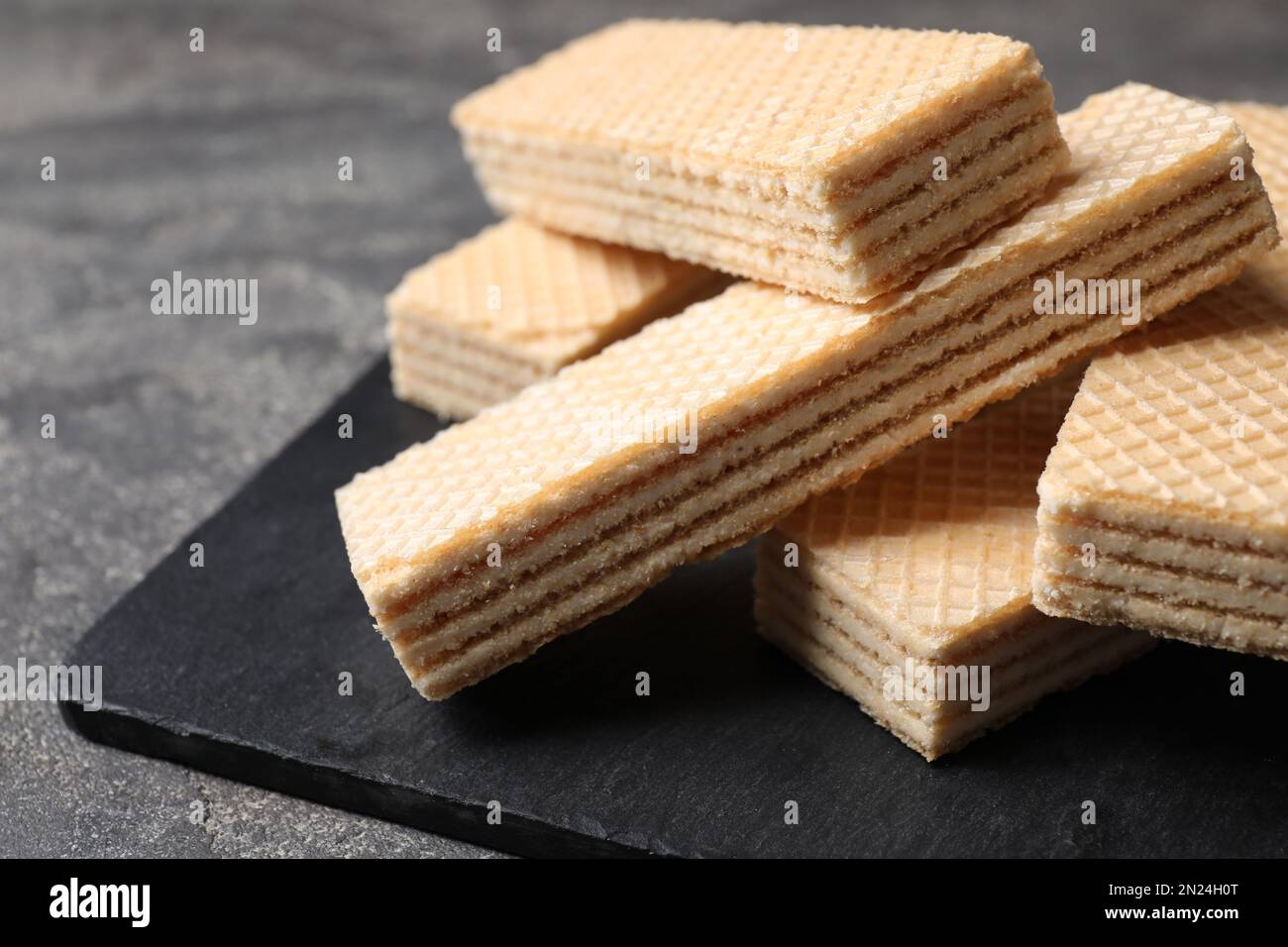 Delicious cream wafers on grey table, closeup Stock Photo - Alamy