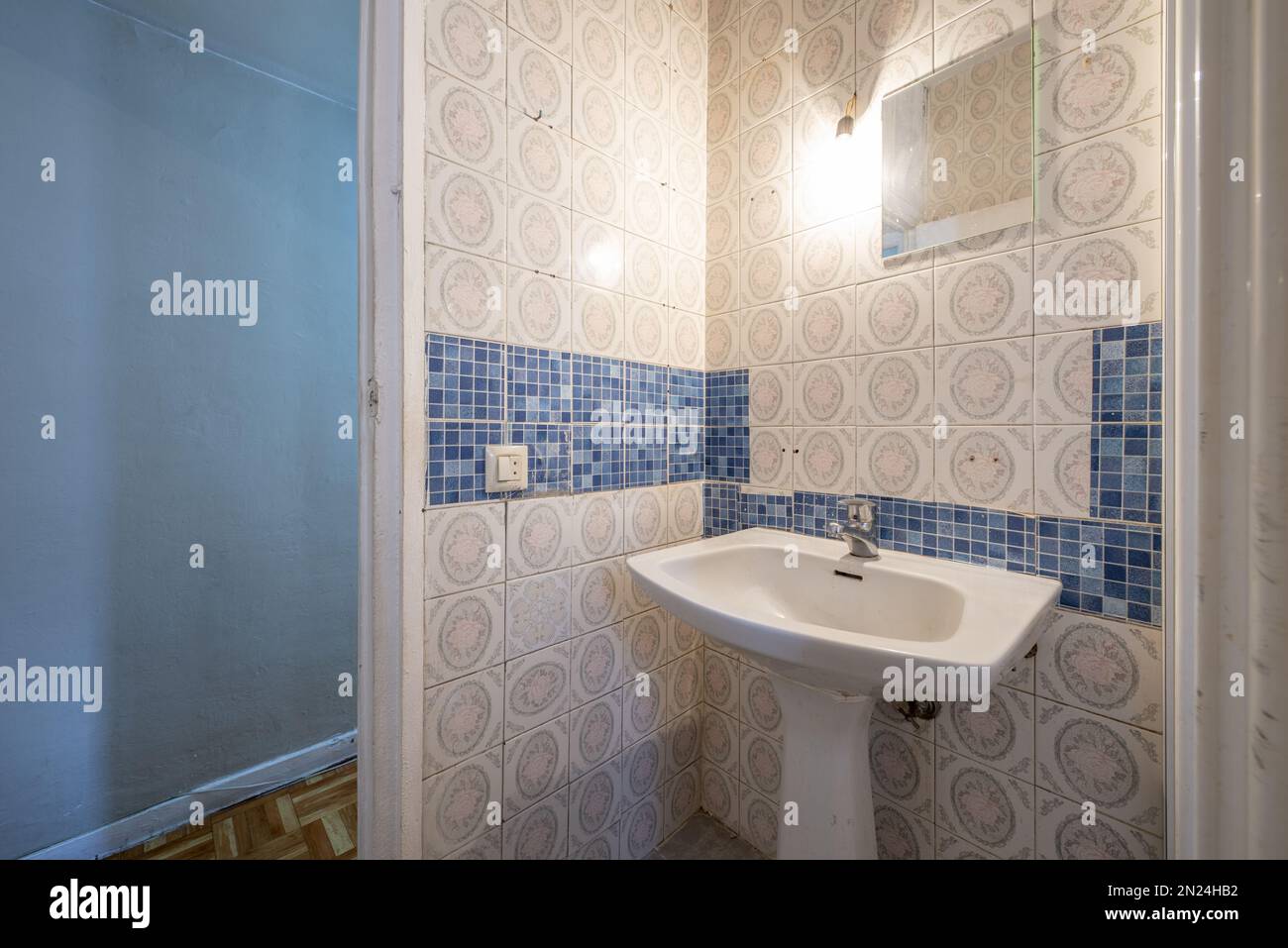 Conventional old bathroom with matching porcelain pedestal sink, and ...