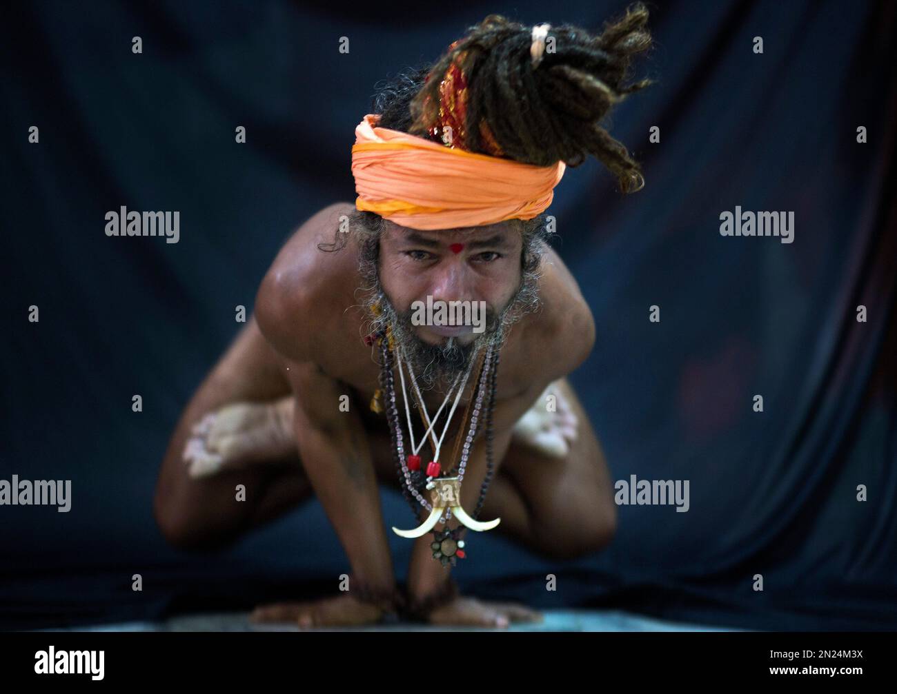 FILE- In this Friday, June 12, 2015 file photo, an Indian Hindu holy ...