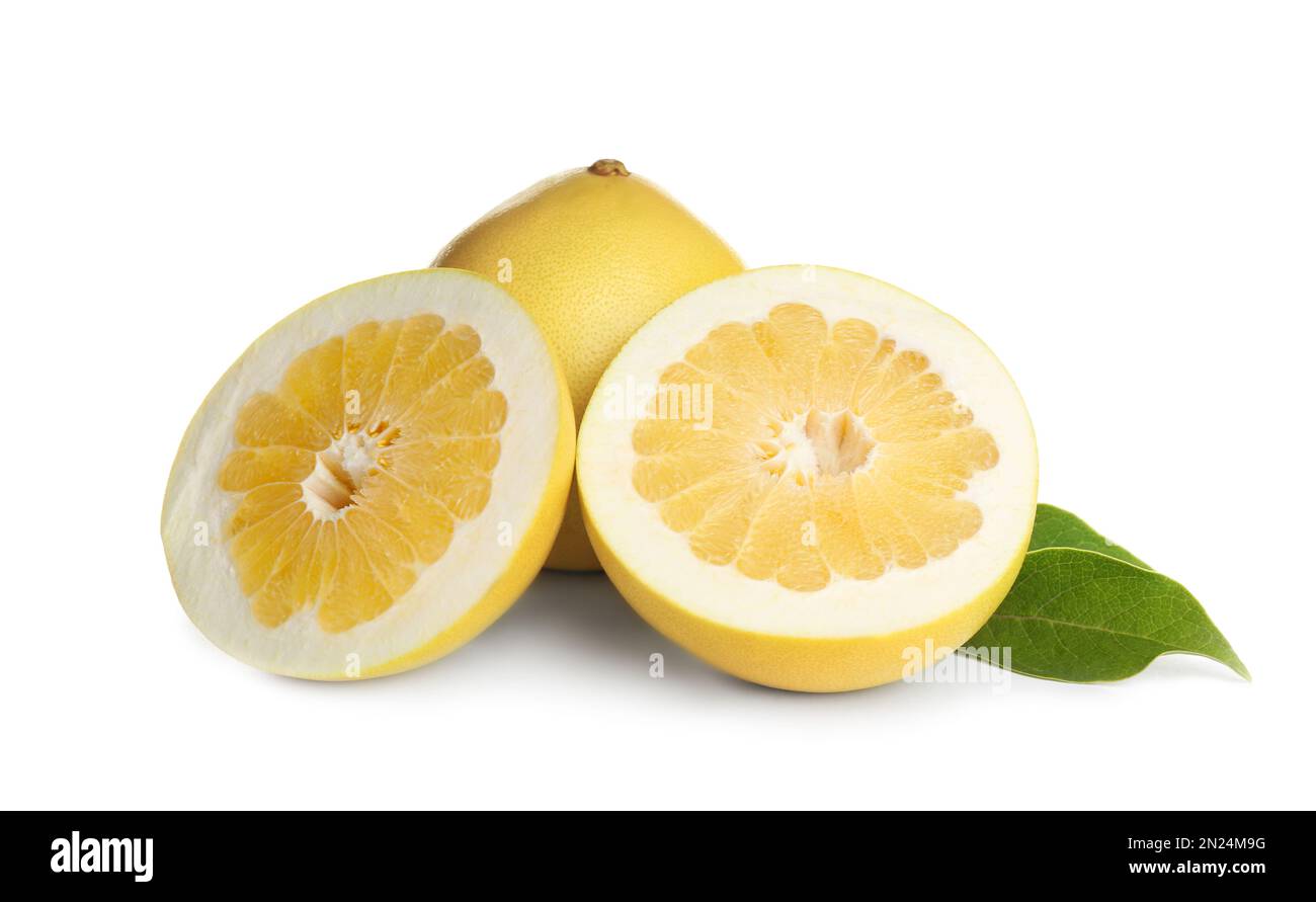 Fresh cut and whole pomelo fruits isolated on white Stock Photo - Alamy