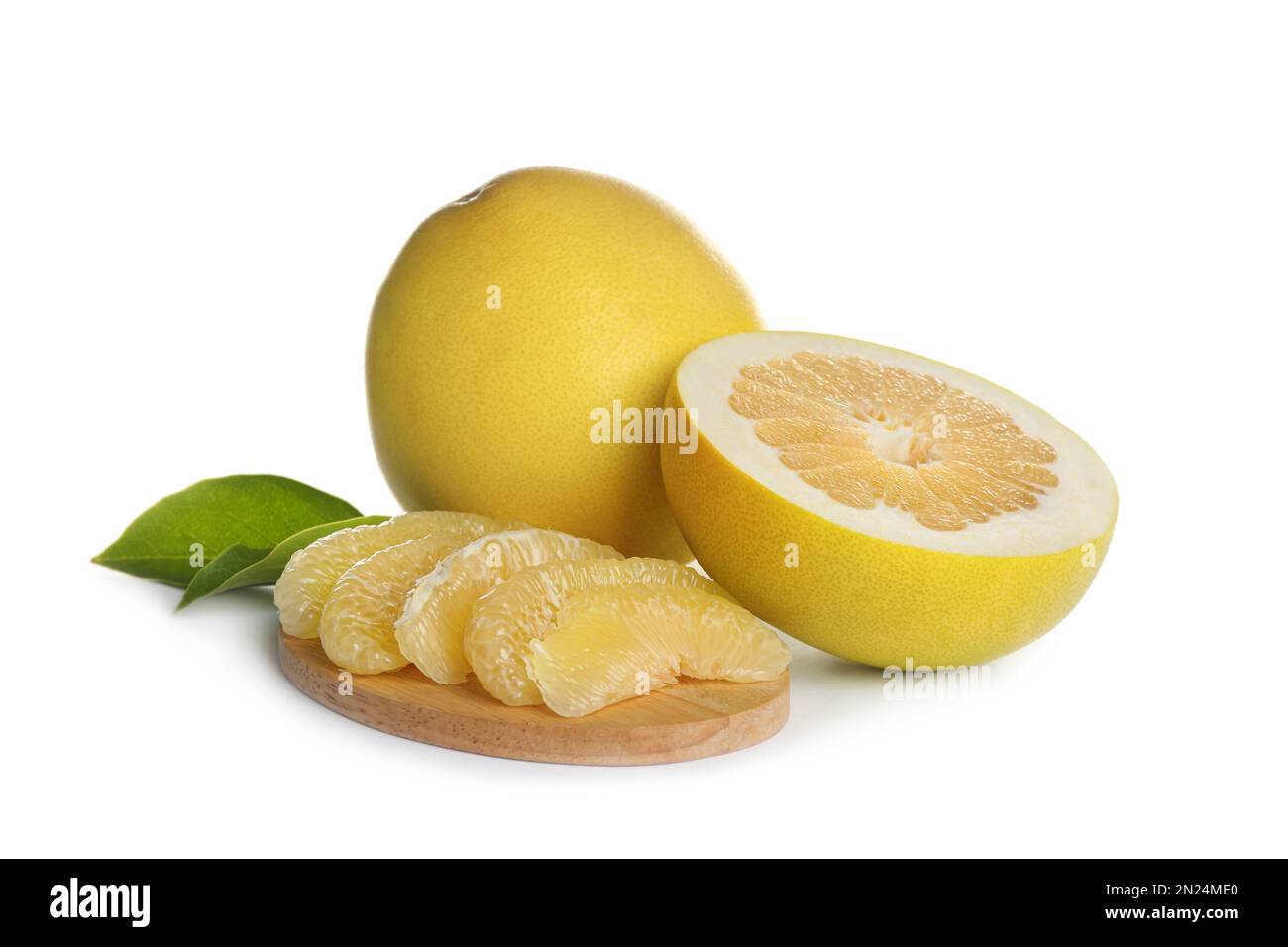 Fresh cut and whole pomelo fruits with slices isolated on white Stock ...