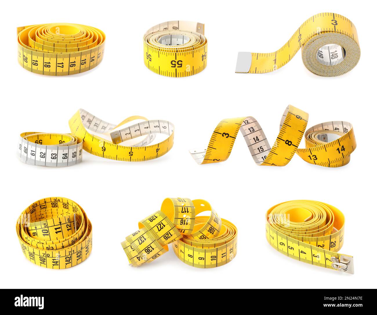 Set of yellow measuring tapes on white background Stock Photo - Alamy