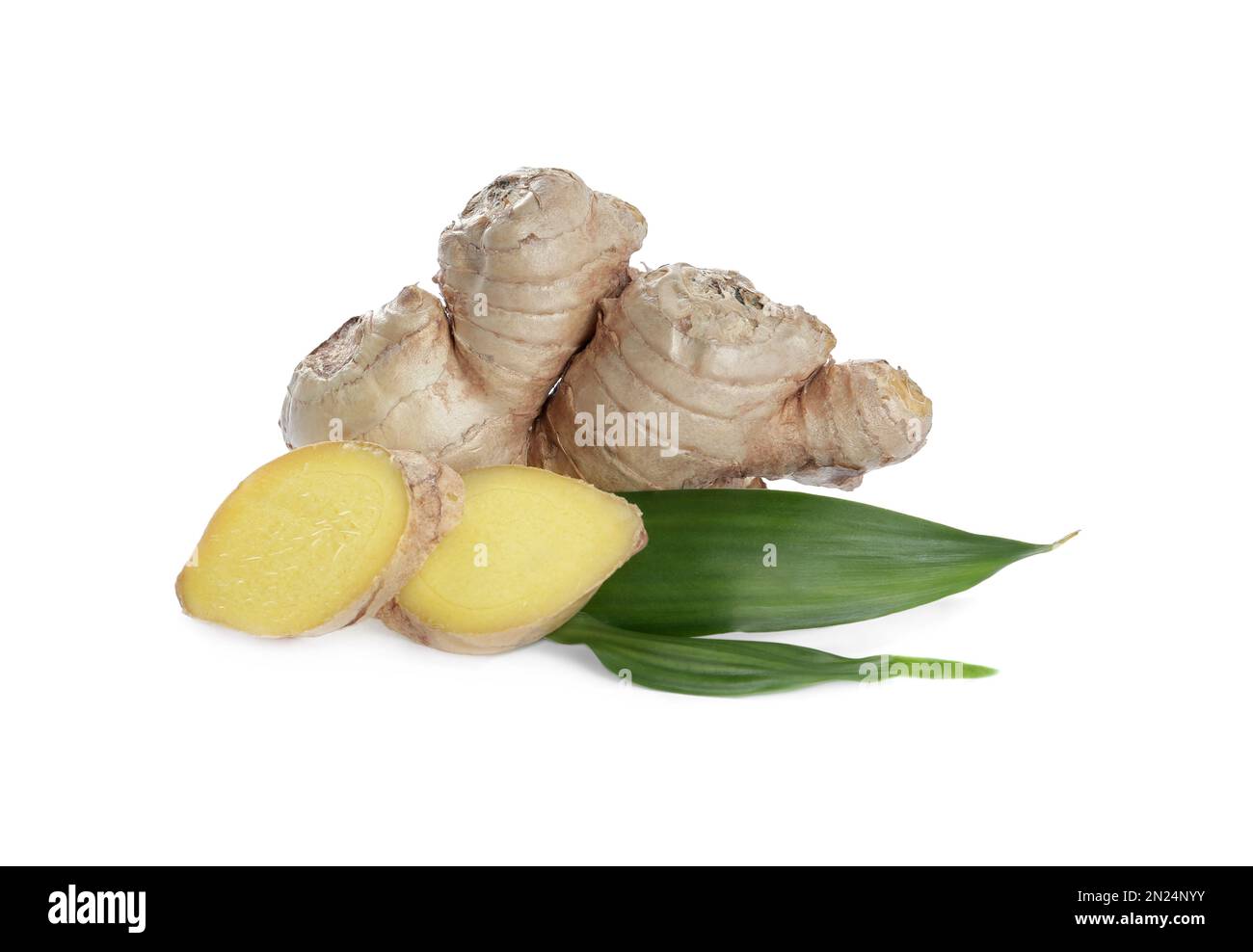 Whole and cut fresh ginger with leaves isolated on white Stock Photo ...