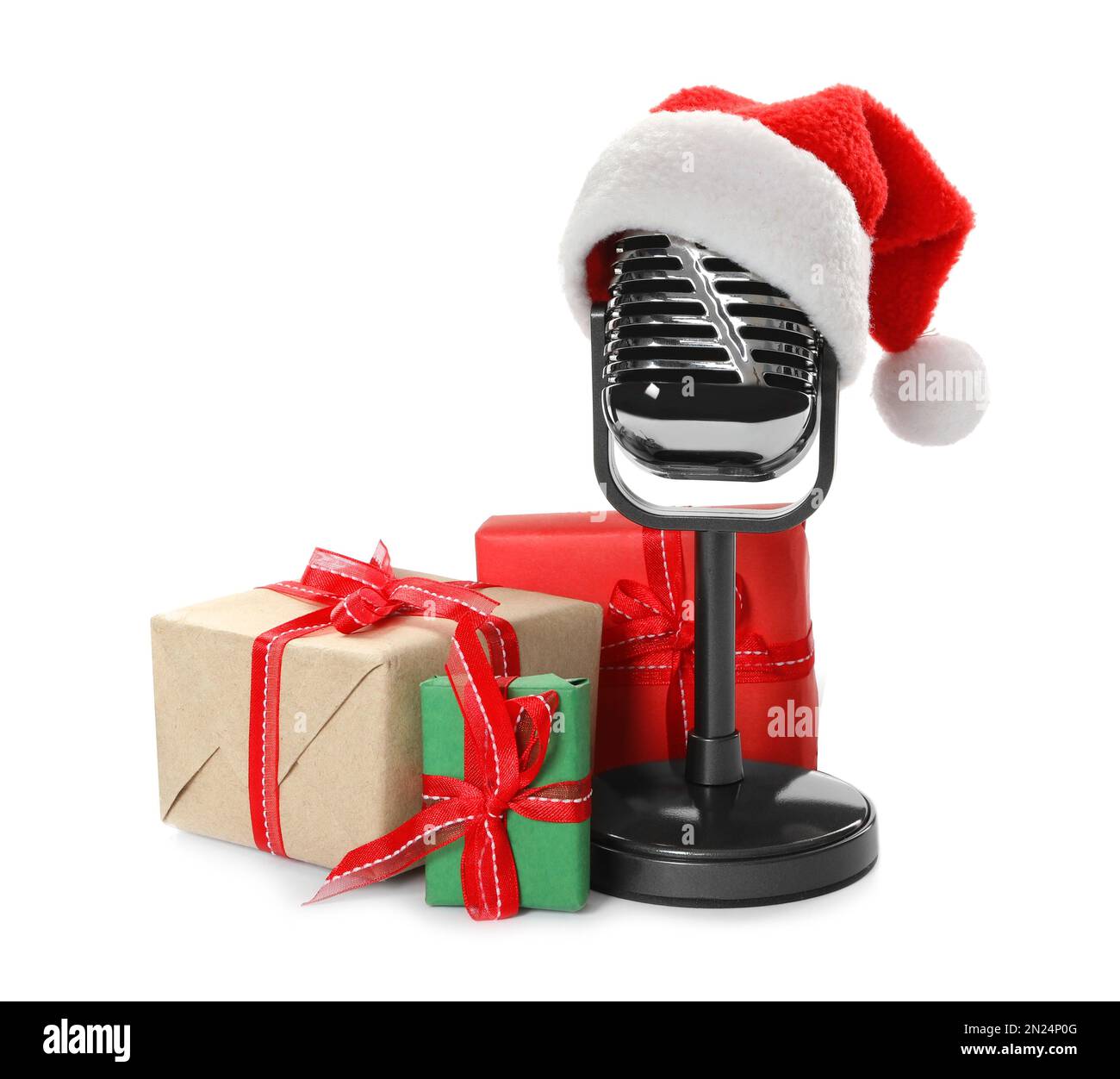 Retro microphone with Santa hat and gift boxes on white background ...