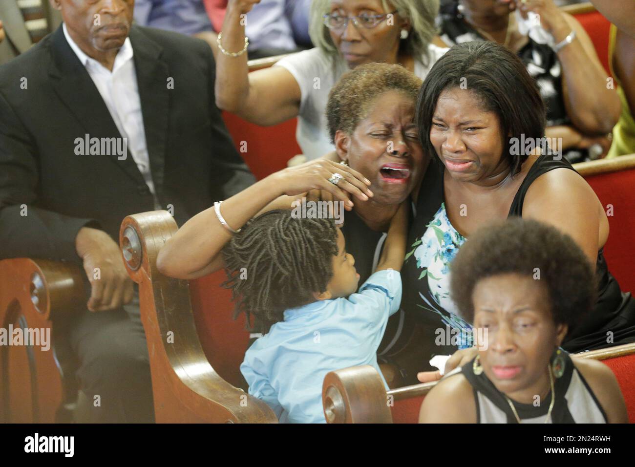 Parishioners pray and weep during services at the Emanuel A.M.E. Church ...