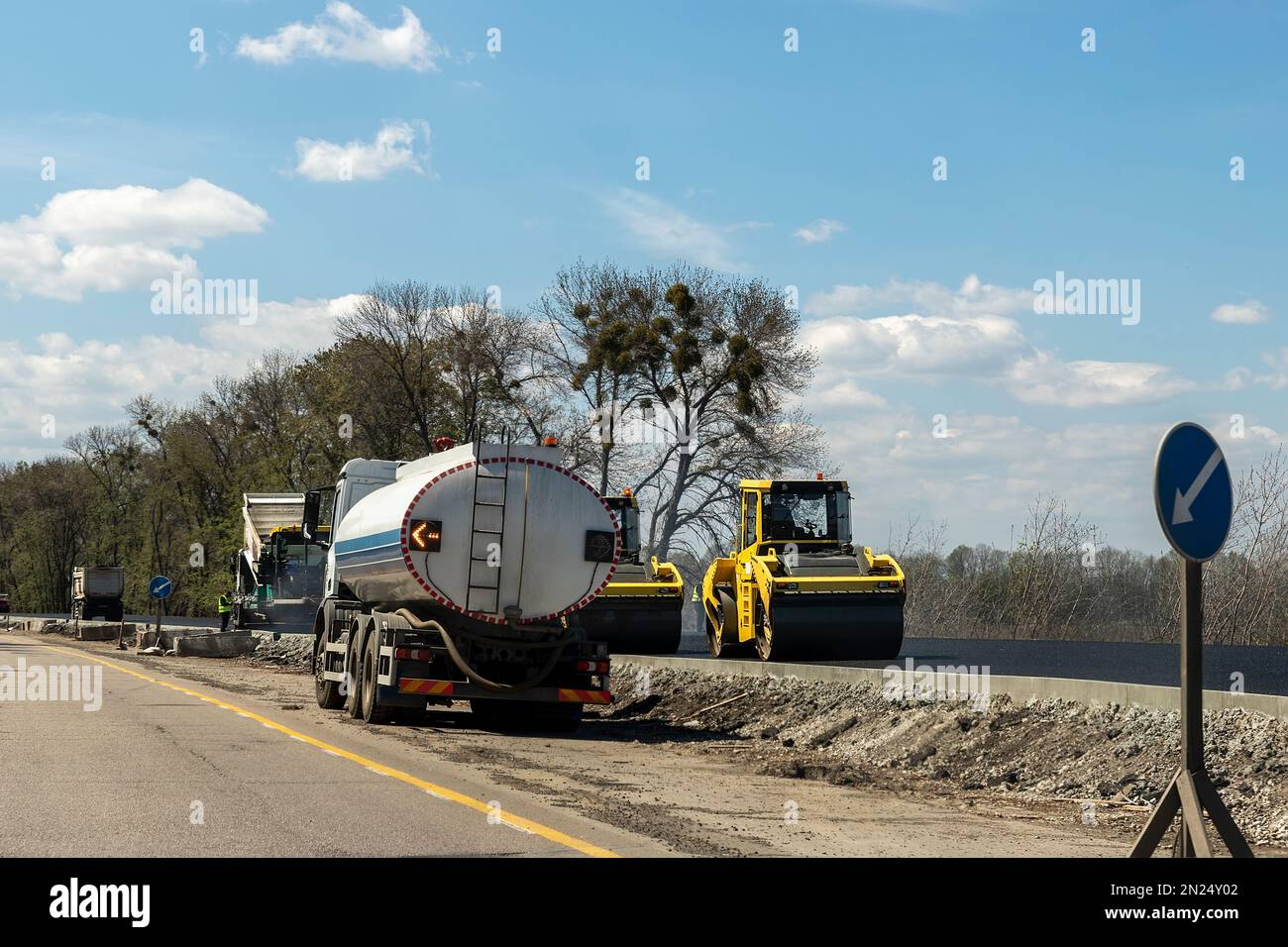 Highway intercity new road construction site with many heavy machinery ...