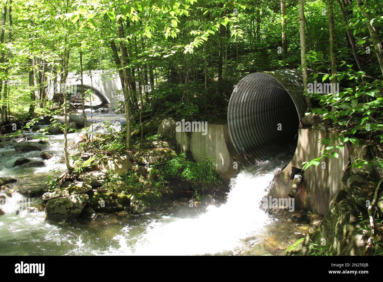 In this Wednesday, June 17, 2015 photo, two culverts a short distance ...