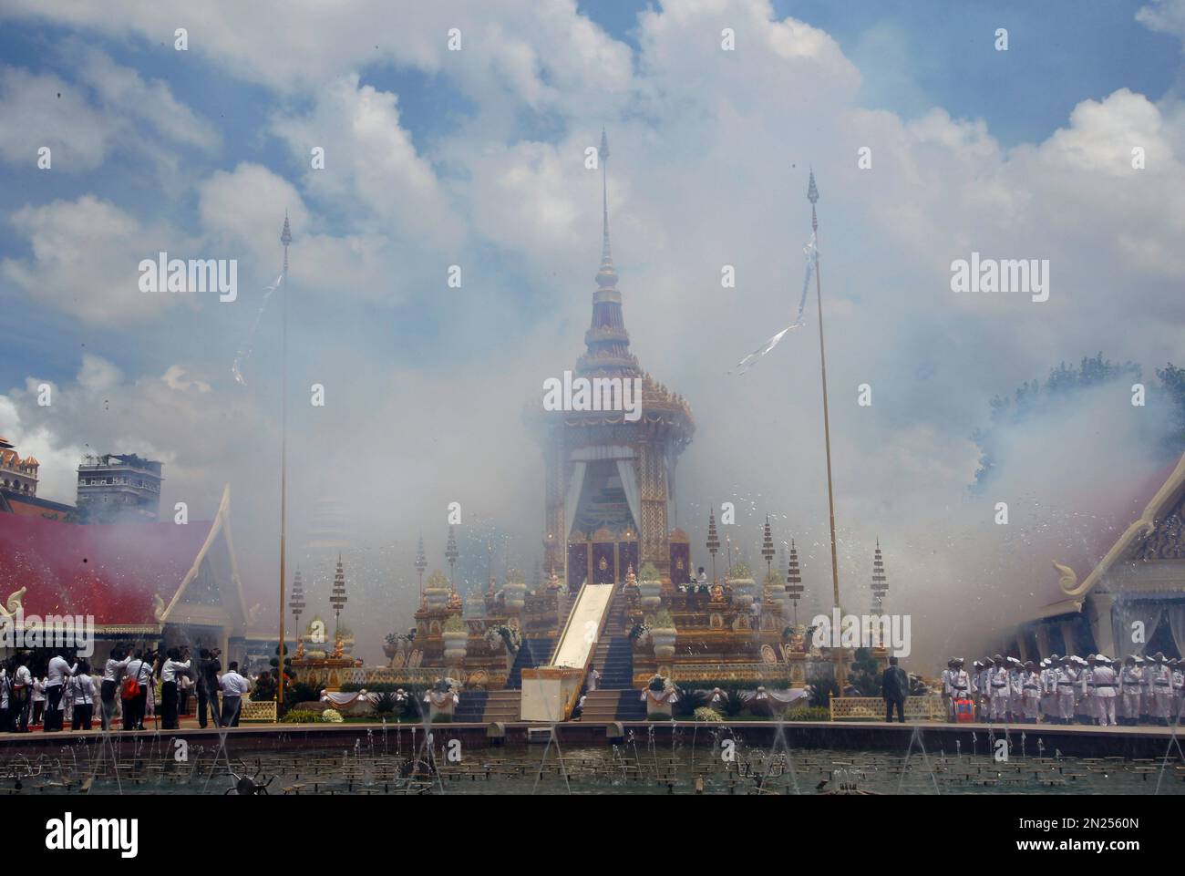 Smoke billows during the cremation of Chea Sim, a key Cambodian ...