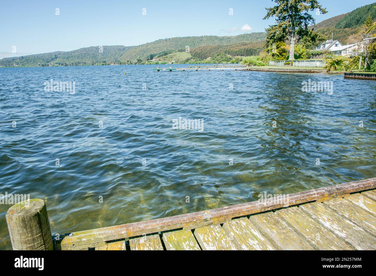 Wind ripples on surface of lake Rotoiti with distant hills Stock Photo ...