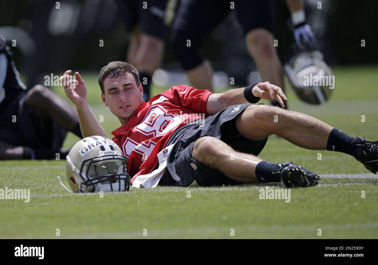 New Orleans Saints quarterback Garrett Grayson (18) stretches during ...