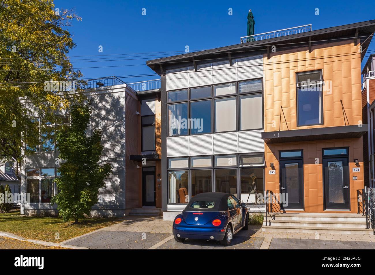 Grey modern and copper 2 apartment unit buildings renovated from old ...