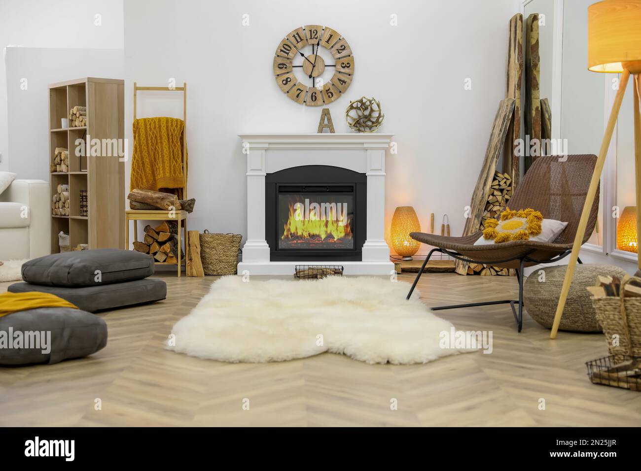 Elegant fireplace with burning flame in contemporary room interior ...