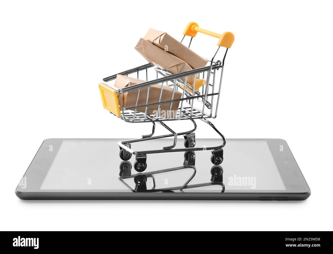 Internet shopping. Small cart with boxes and modern tablet on white ...