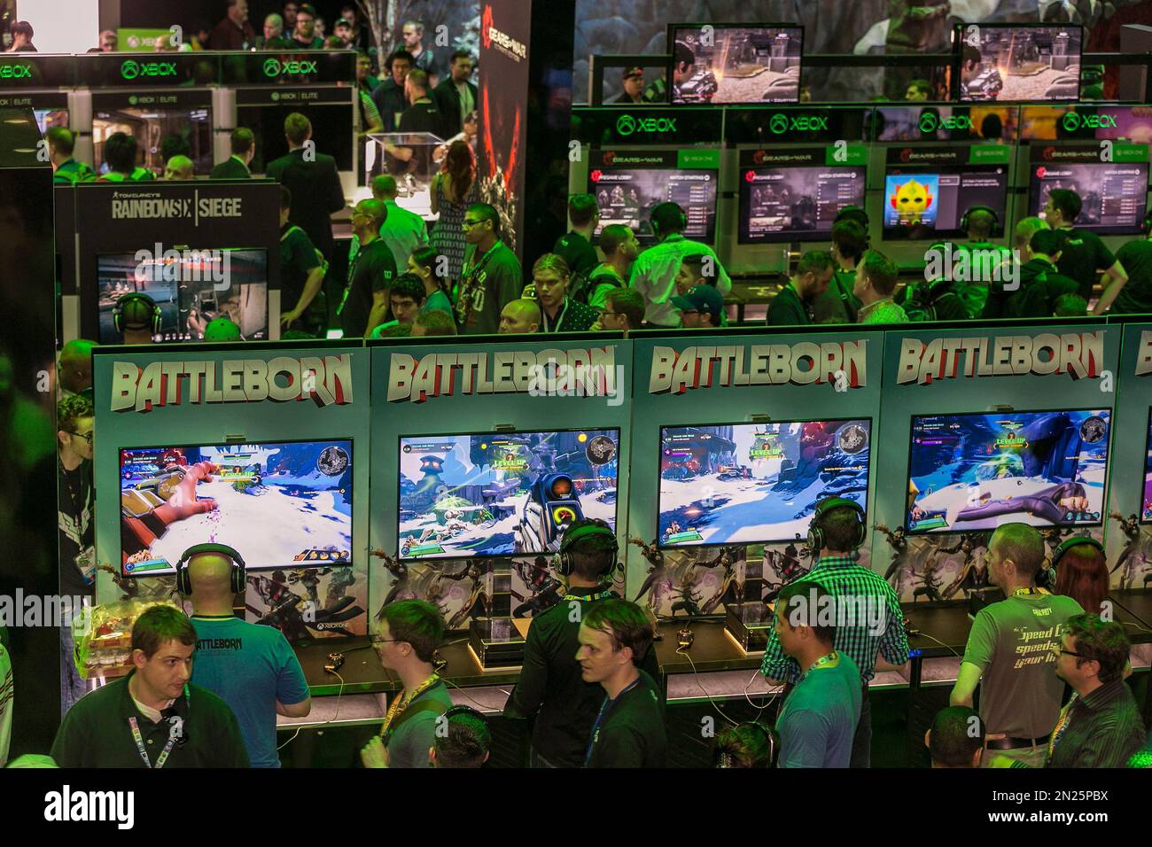Attendees play video games at the Microsoft Xbox exhibit at the E3 ...