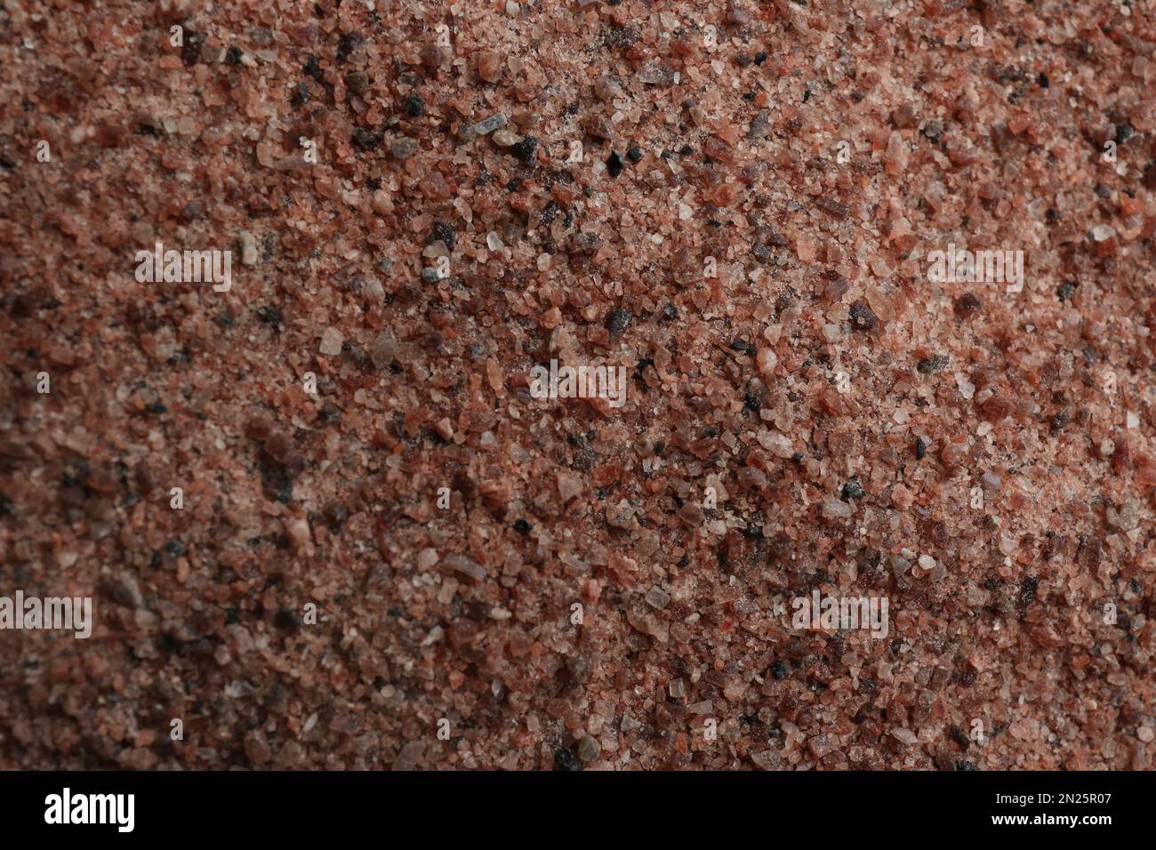 Pile of ground black salt as background, top view Stock Photo - Alamy