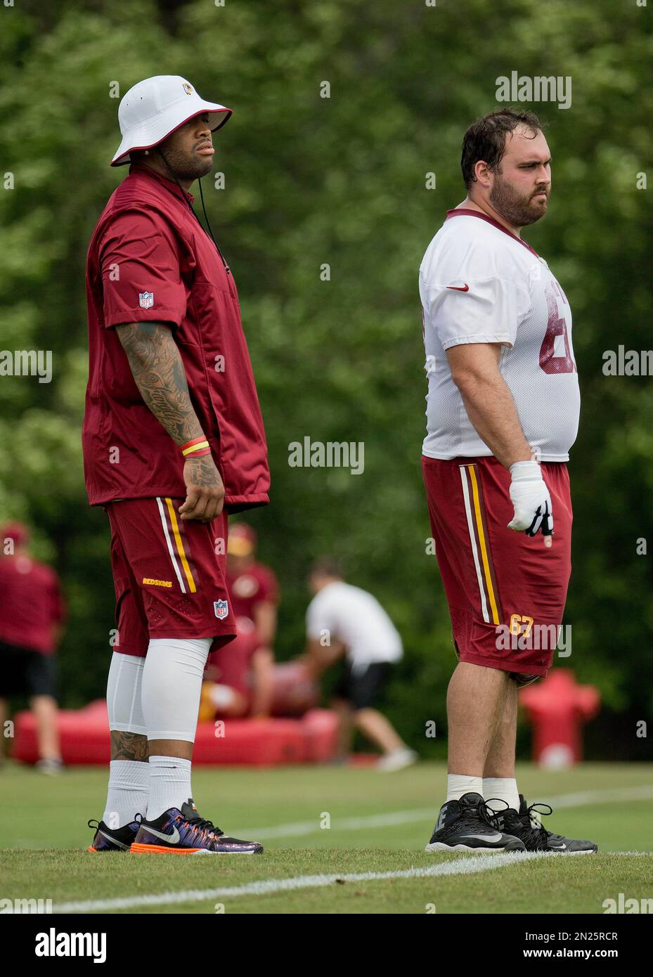 Washington Redskins Trent Williams, left, and Josh LeRibeus, right ...