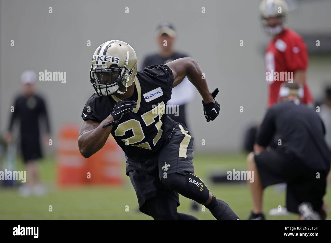 New Orleans Saints running back Edwin Baker (27) runs through drills during mini camp at their ...