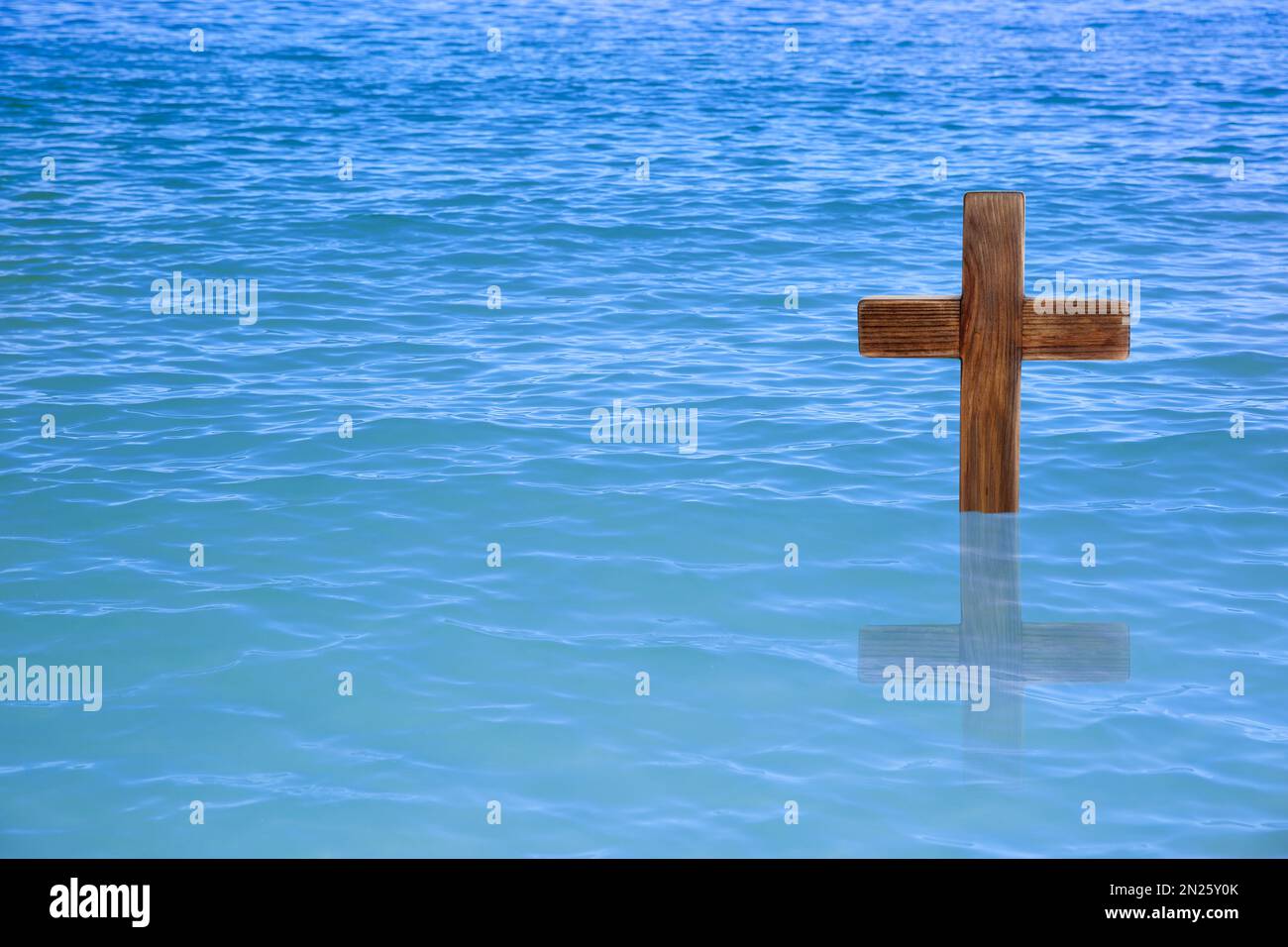 Wooden cross in river for religious ritual known as baptism Stock Photo ...