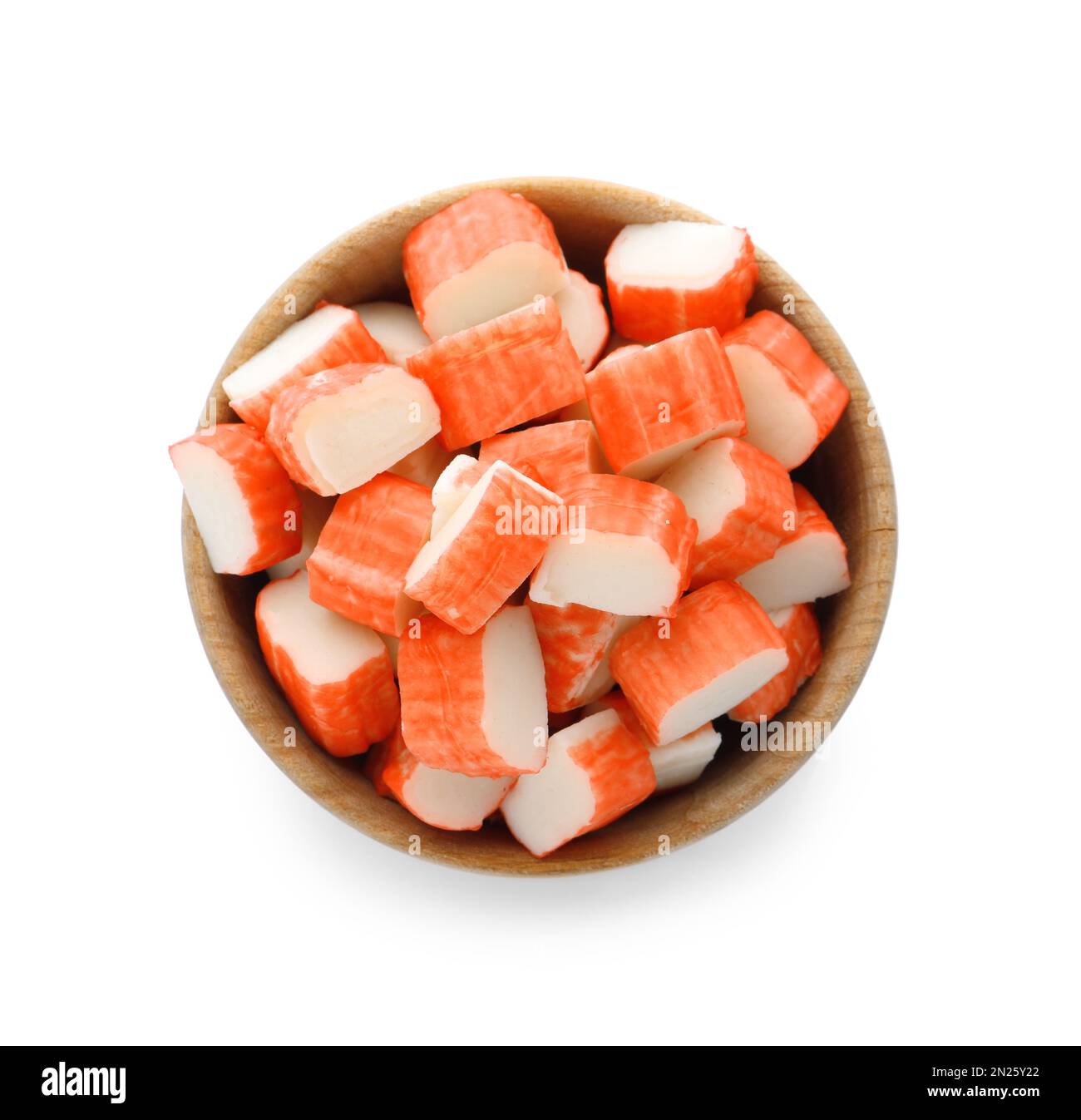 Cut crab sticks in bowl on white background, top view Stock Photo - Alamy