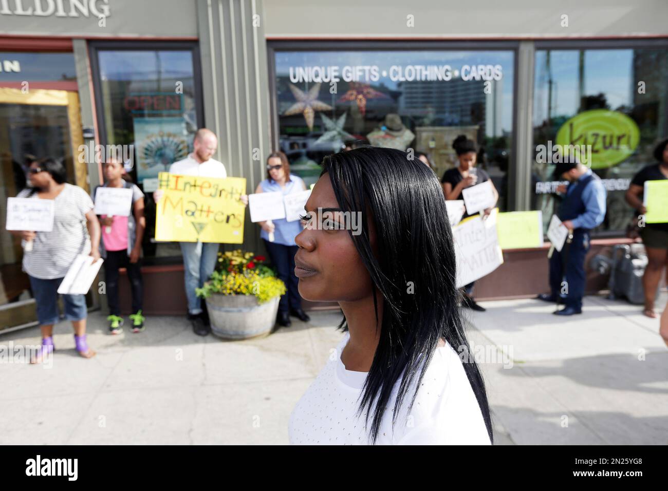 Kitara Johnson speaks to the media during a demonstration for local ...