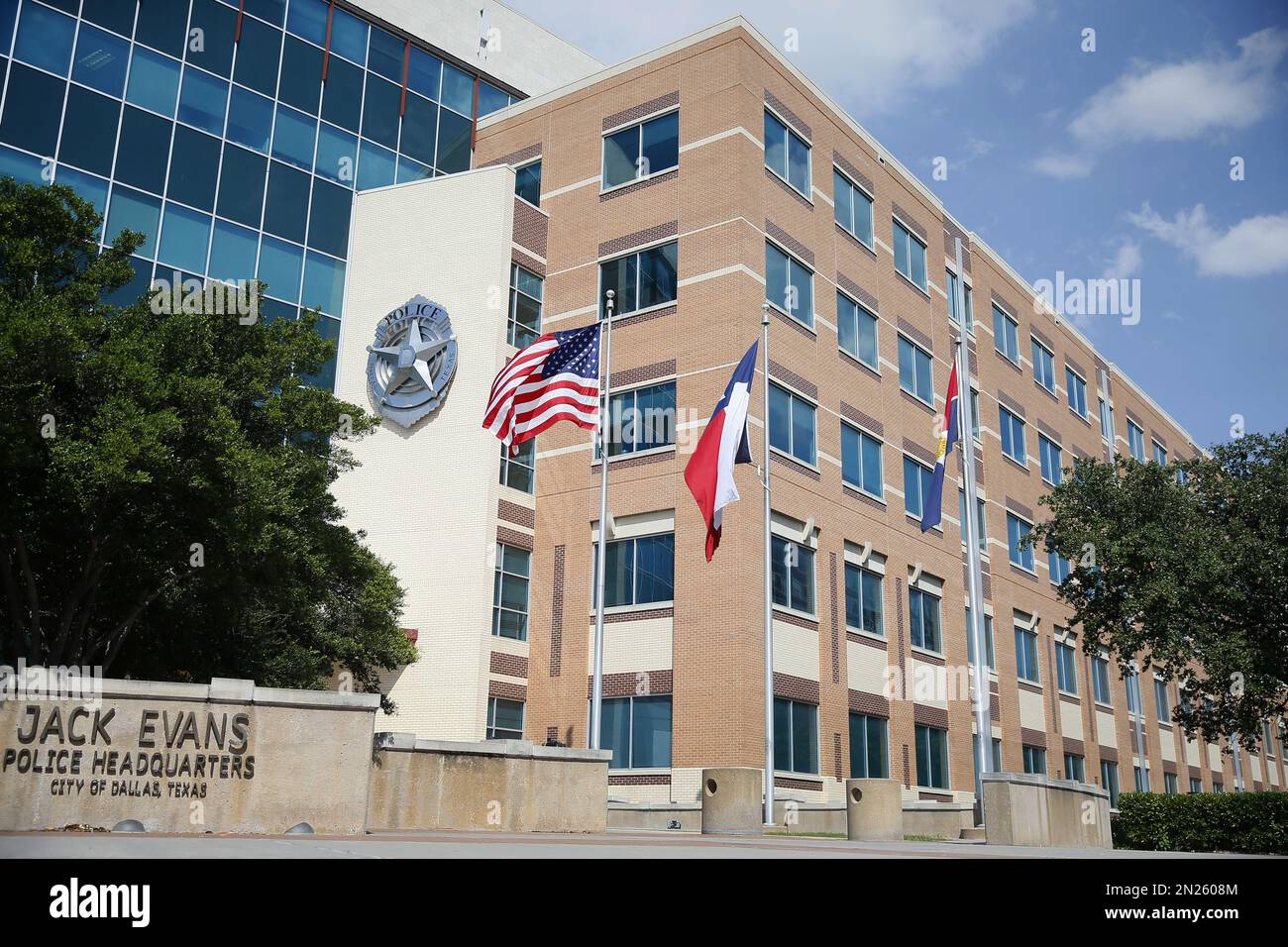 Clouds pass over the Dallas police headquarters building Monday, June ...