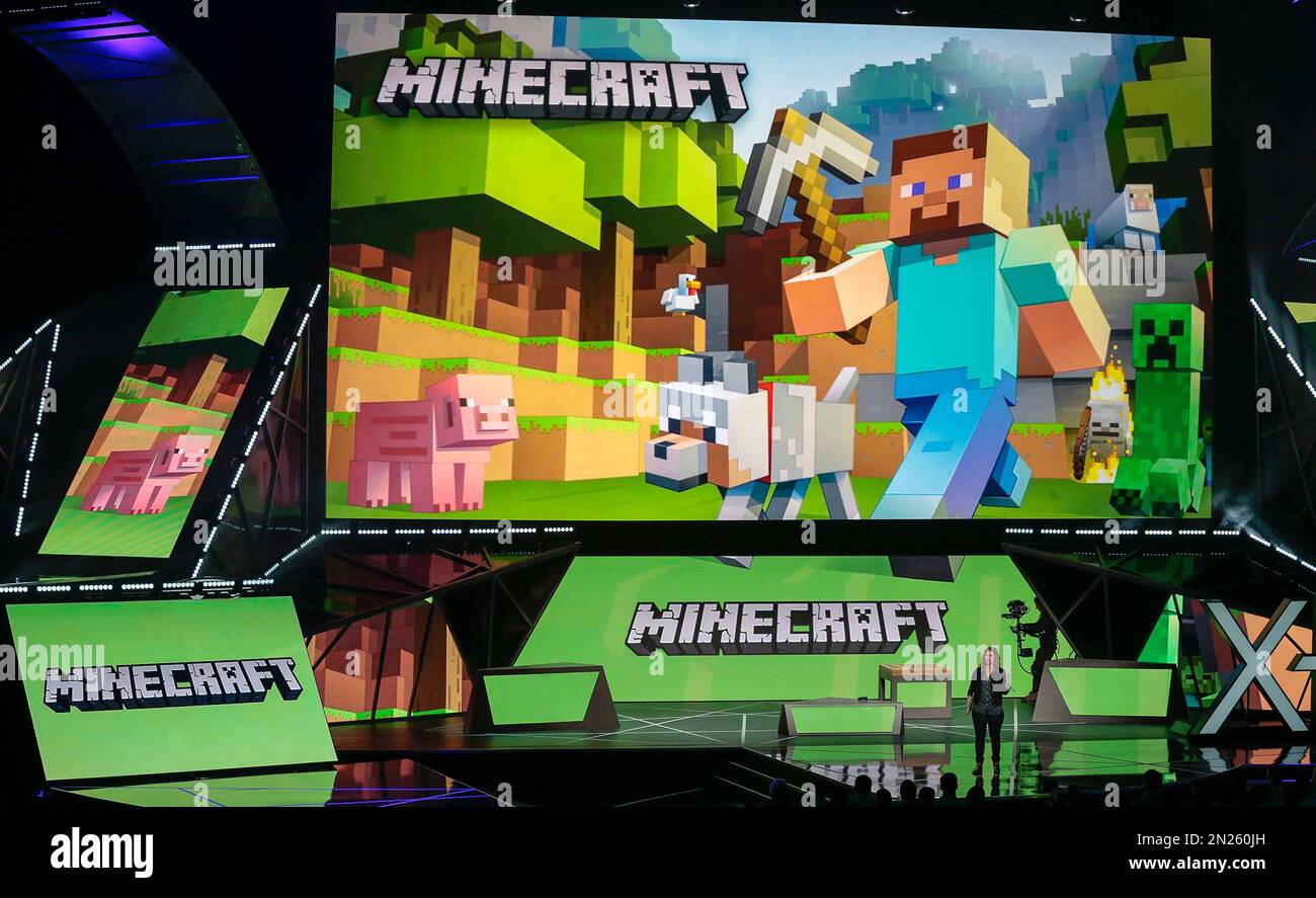 Lydia Winters, at podium, shows off Microsoft's "Minecraft" built ...