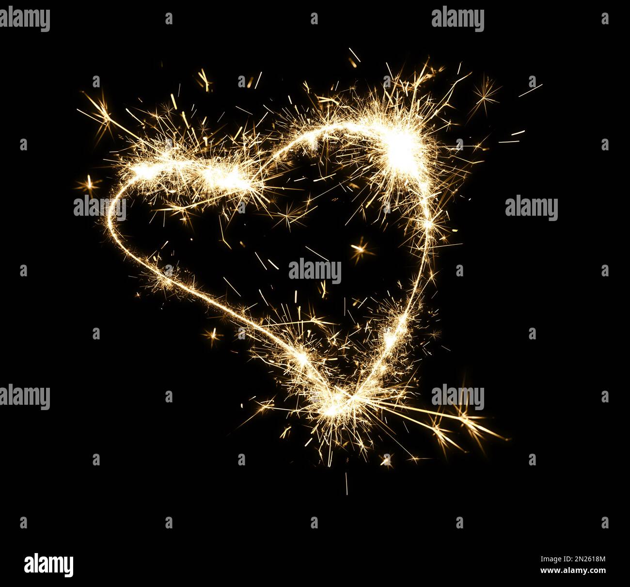 Bright sparkling heart contour on black background Stock Photo - Alamy