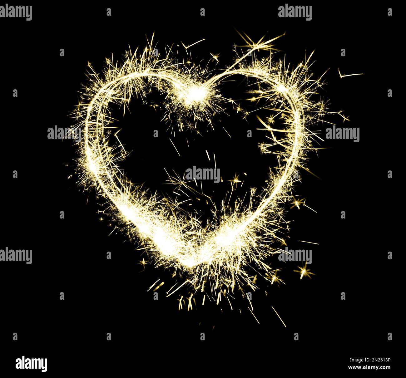 Bright sparkling heart contour on black background Stock Photo - Alamy