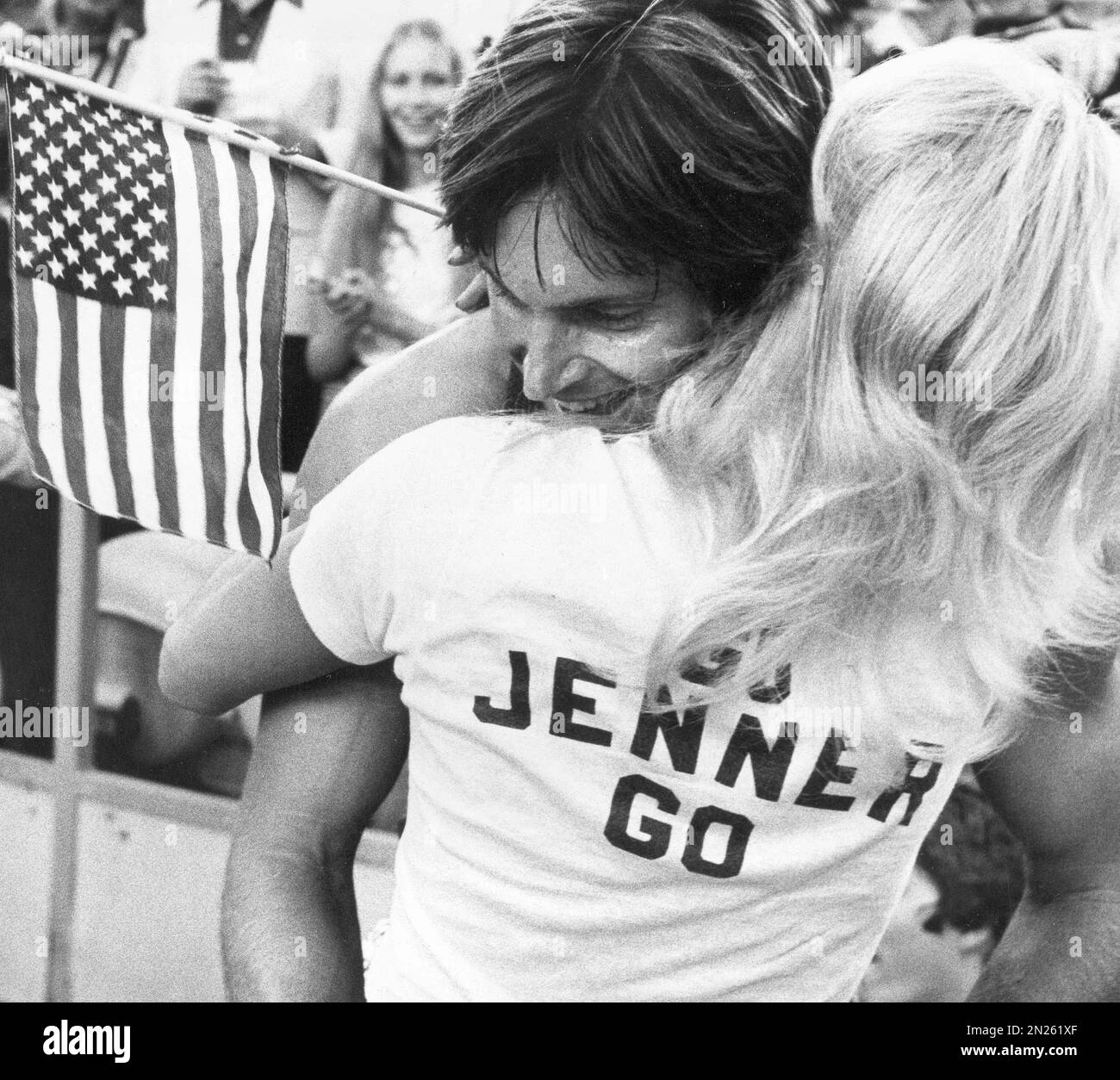 U.S. decathlon athlete Bruce Jenner gets a hug from his wife Chrystie ...