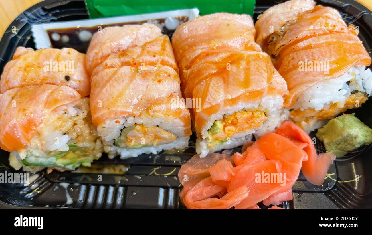 Sushi in plastic container takeout dinner Stock Photo - Alamy