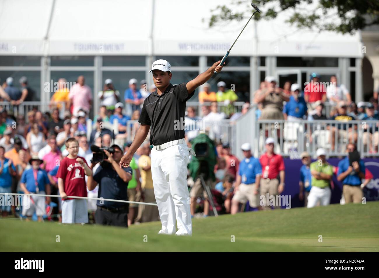 Fabian Gomez, of Argentina, celebrates his birdie putt on the 18th ...