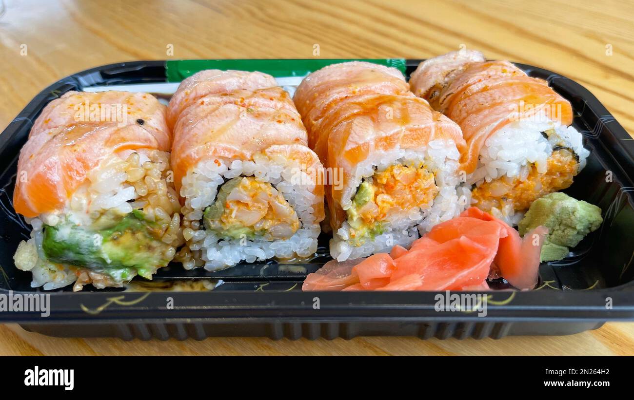 Sushi in plastic container takeout dinner Stock Photo - Alamy