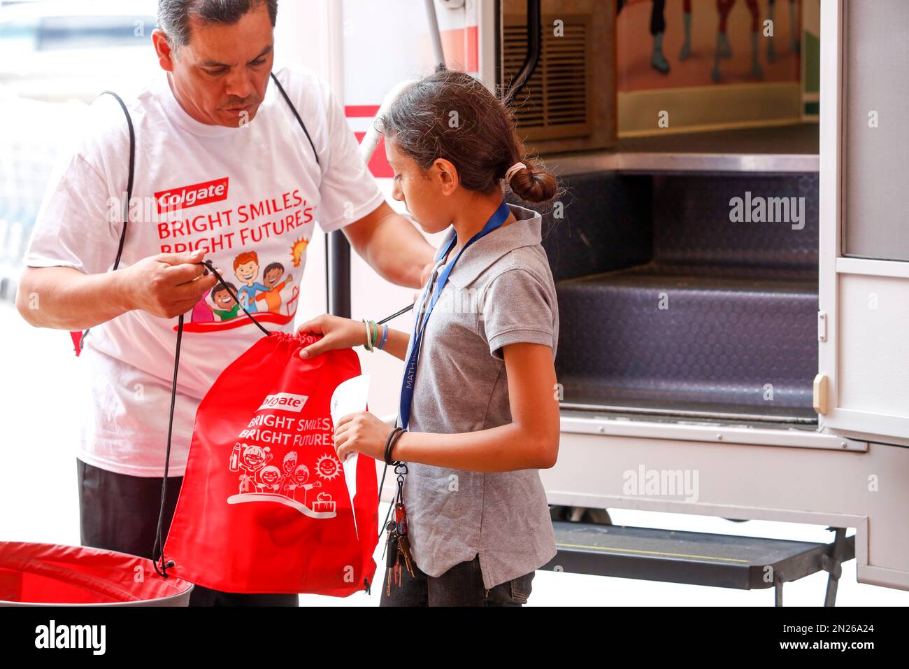 IMAGE DISTRIBUTED FOR COLGATE - Free dental supplies are given out as ...