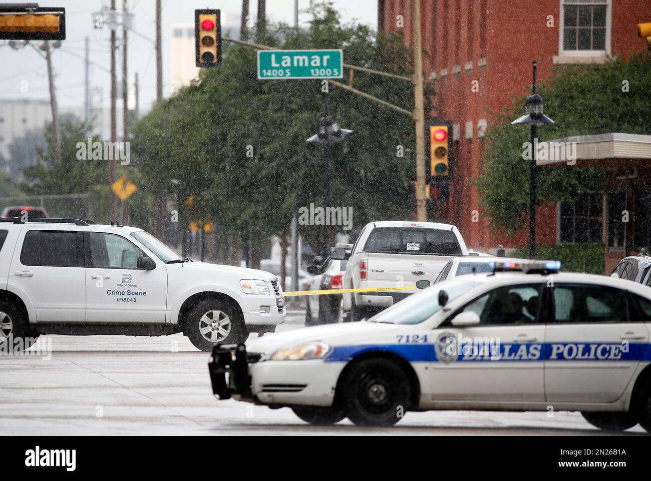Dallas police crime scene and police vehicles block off Lamar street in ...