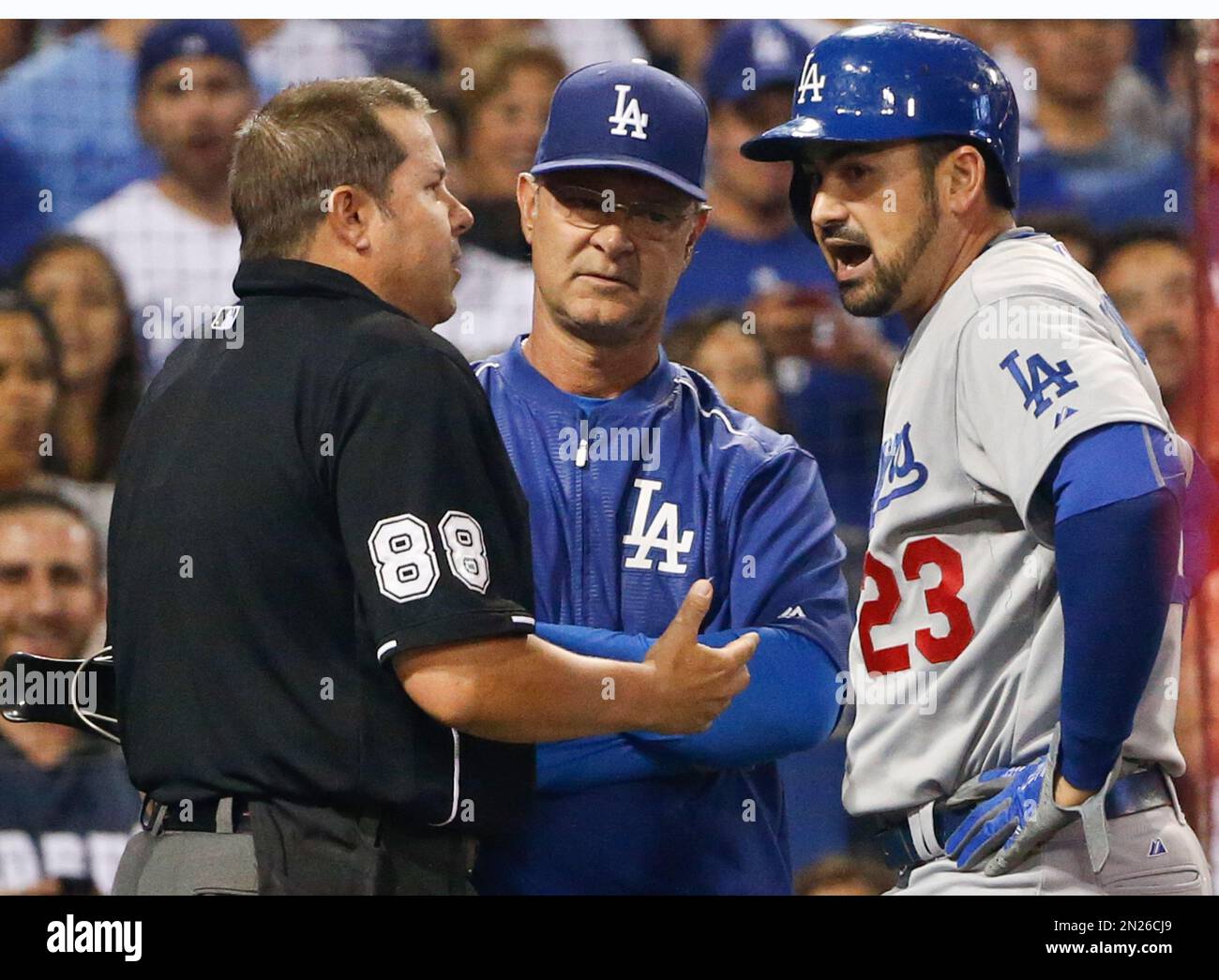 Los Angeles Dodgers' Adrian Gonzalez, right, and manager Don Mattingly ...