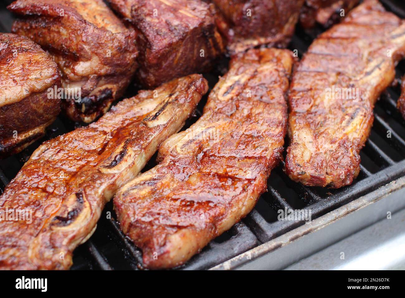 This June 8, 2015 photo shows orange barbecue beef short ribs in ...