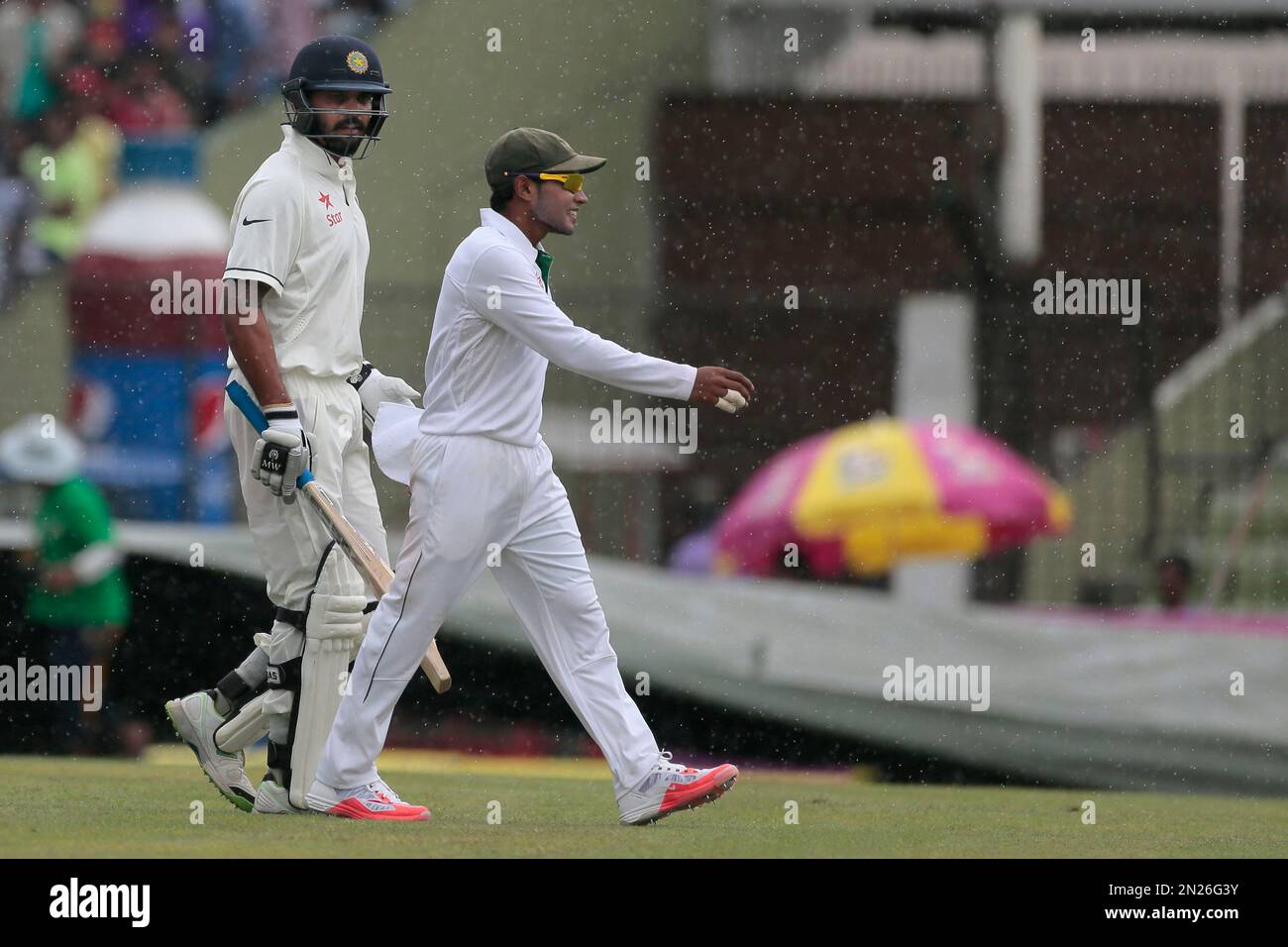 Bangladesh’s test match captain Mushfiqur Rahim, right, and India’s ...