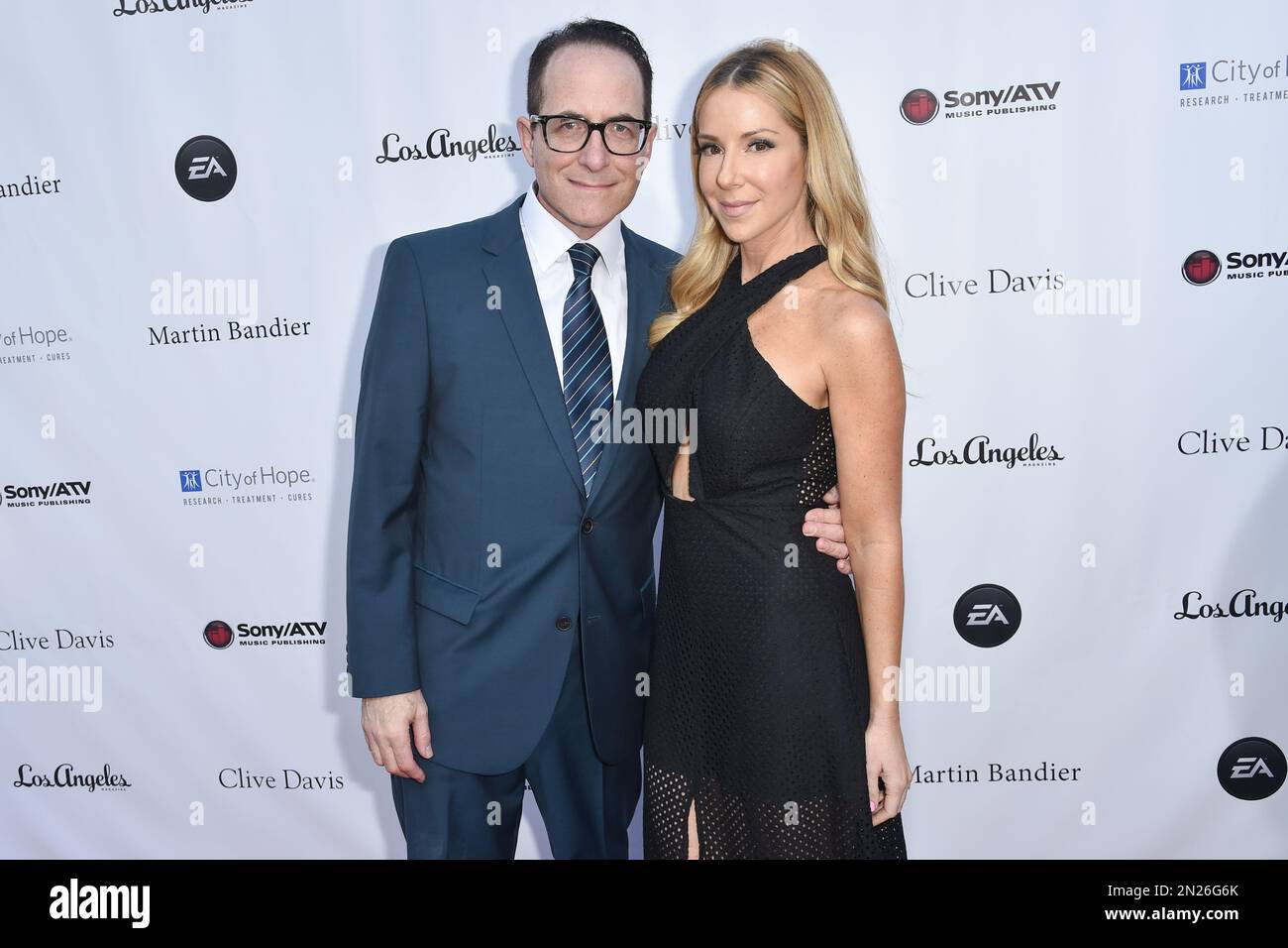 Ron Fair, left, and Stefanie Ridel arrive at the 11th annual Songs Of ...