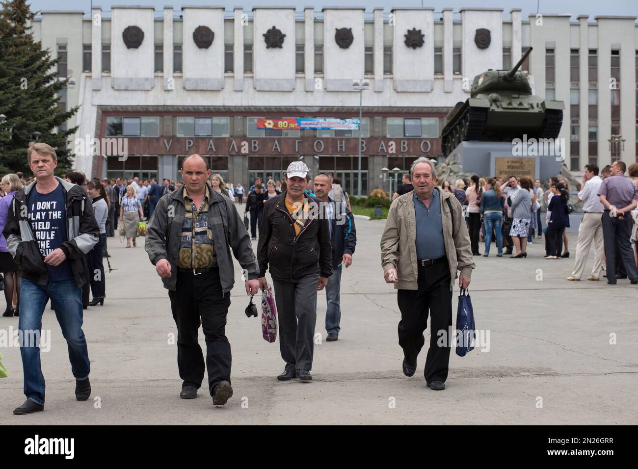 In this photo taken on Friday, May 29, 2015, employees leave the ...