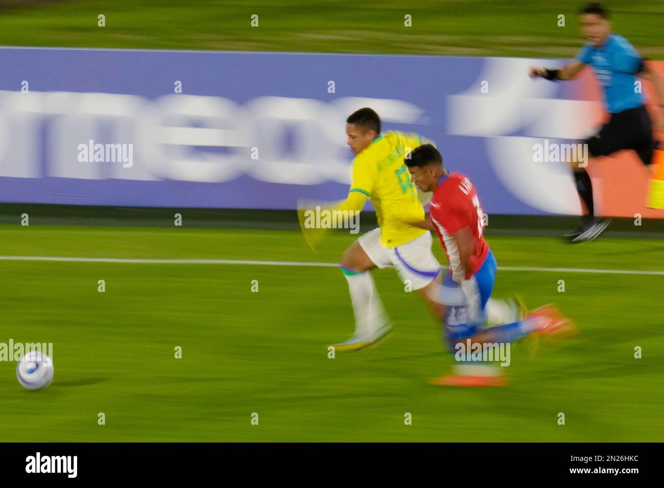 Brazil's Vitor Roque, left, and Paraguay's Gilberto Flores battle for ...