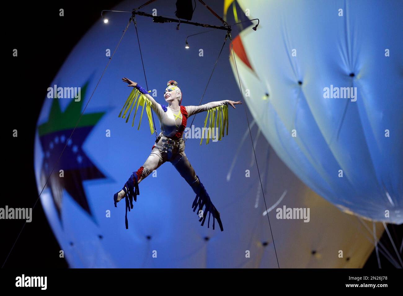 An acrobat performs during the opening ceremony of the Copa America ...