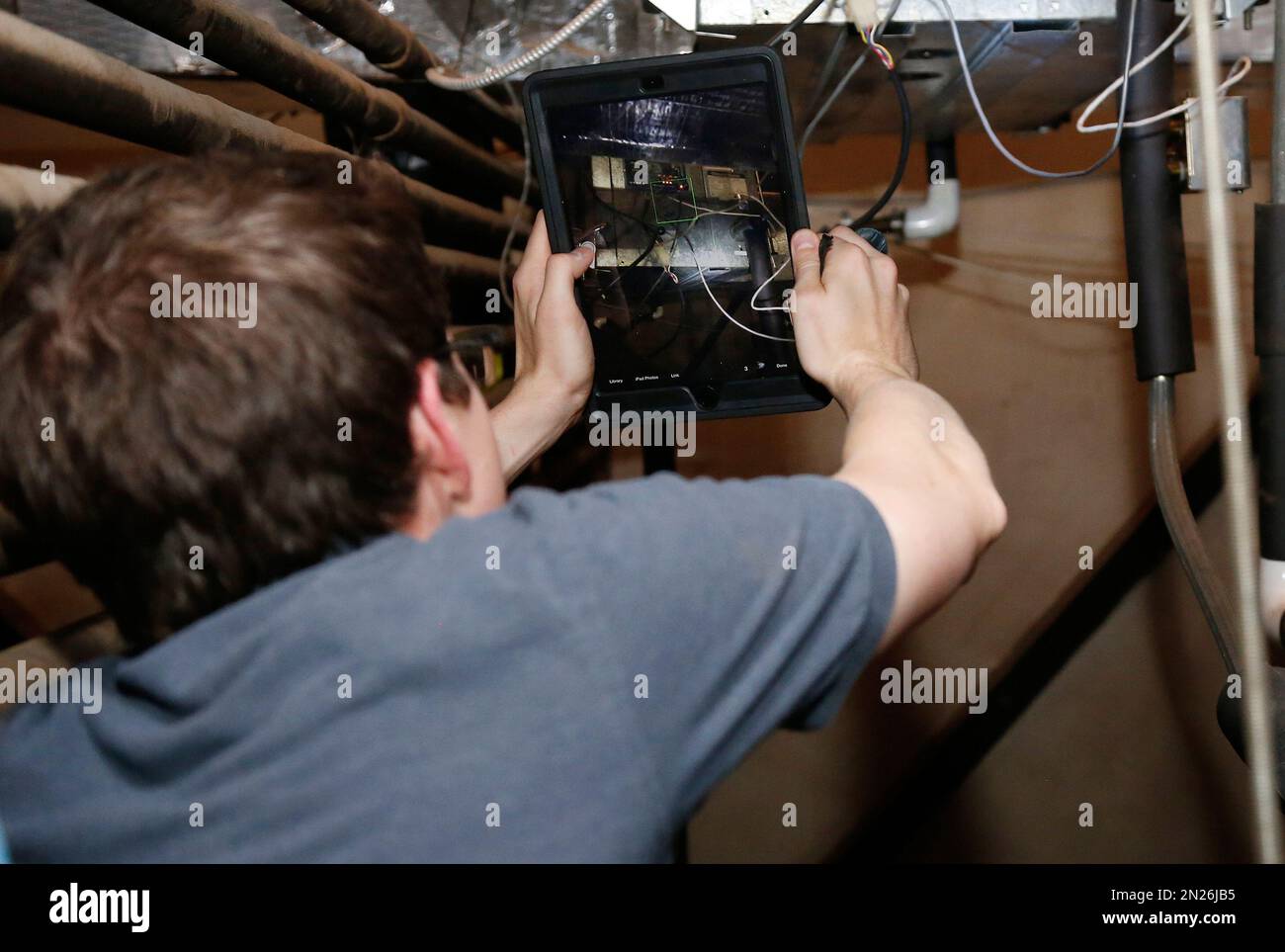 In this Wednesday, June 10, 2015 photo, Korey Wheeler, a mechanical ...