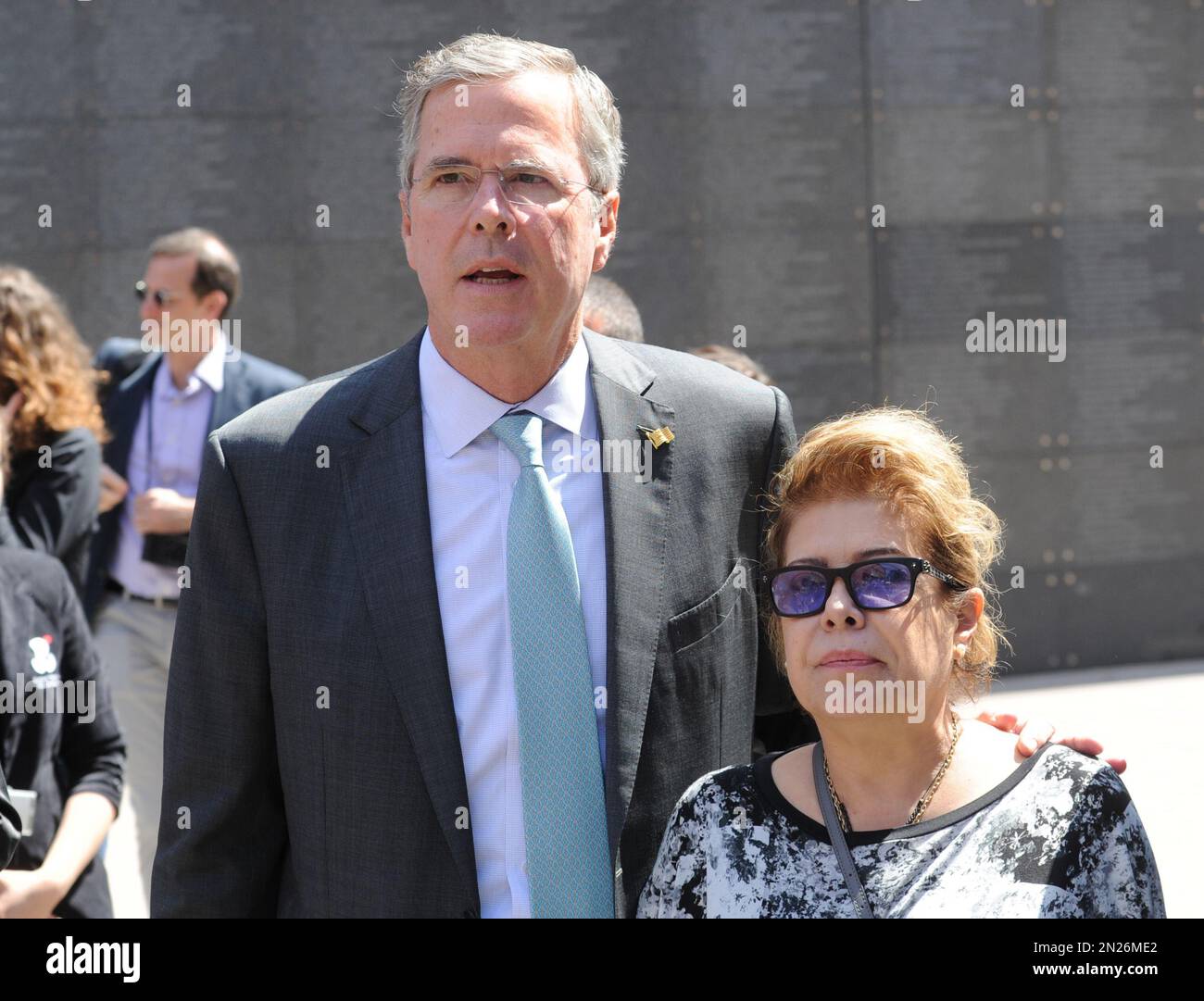 Former US Governor of Florida Jeb Bush with wife Columba stand in front ...