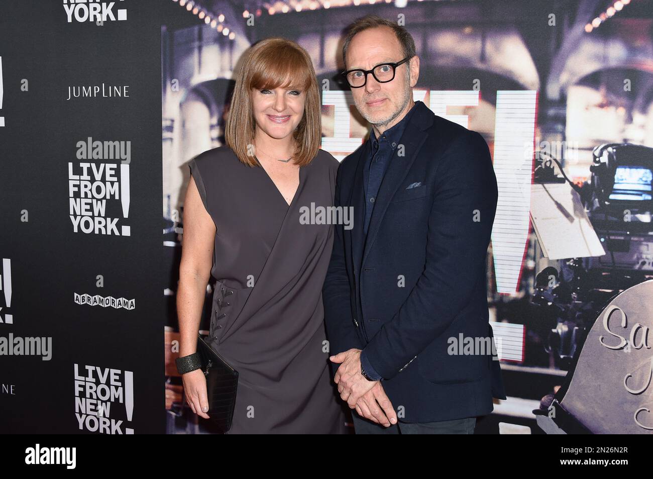 Sarah Cowperthwaite, left and Tom Broecker arrive at the Los Angeles ...